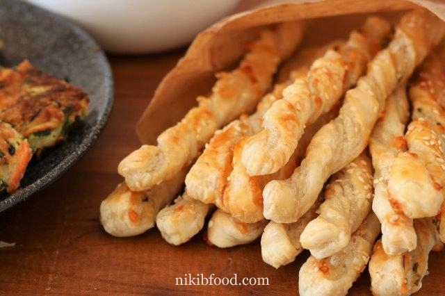Parmesan Sticks - Crispy golden parmesan sticks full of gooey cheese.